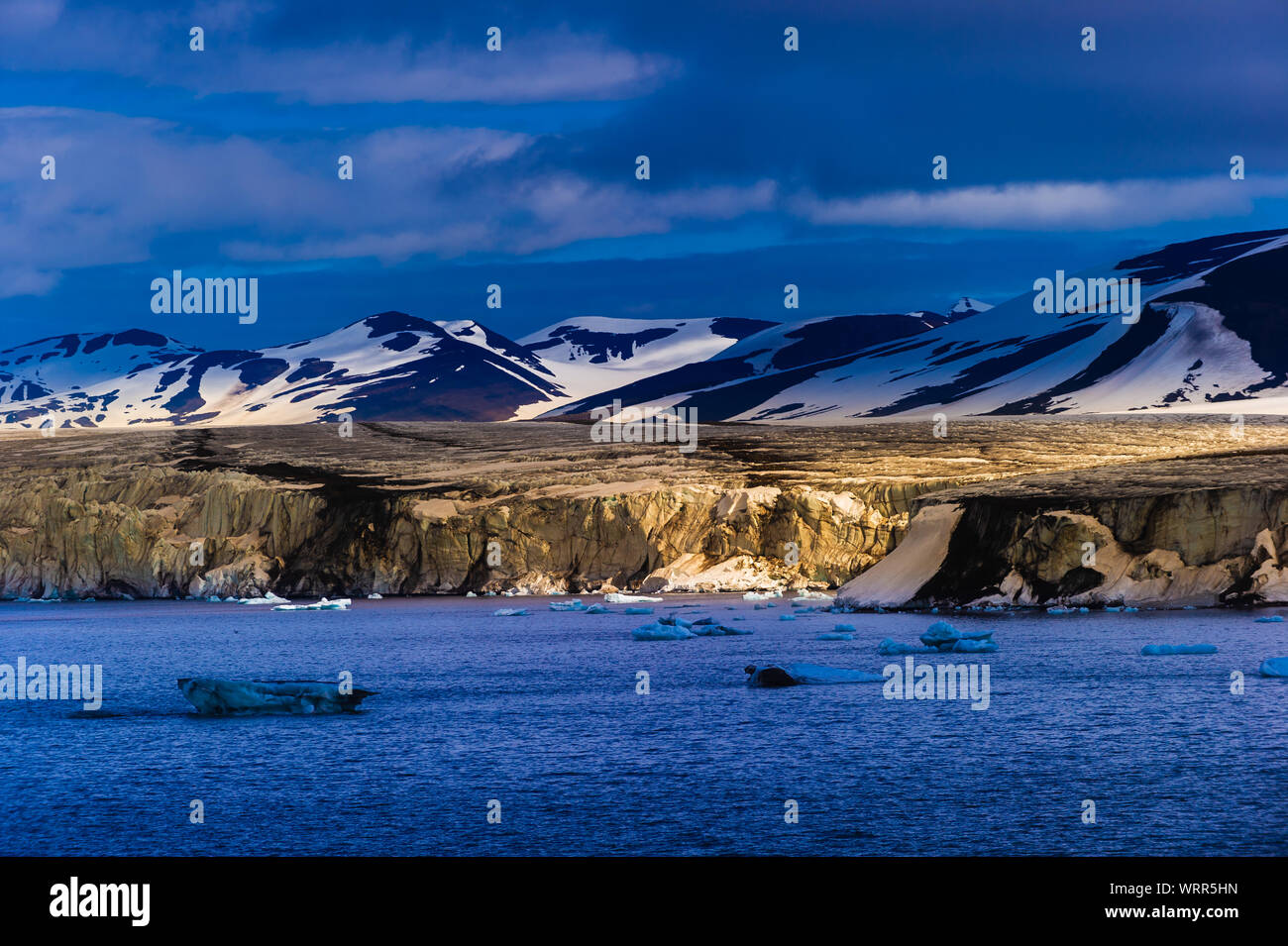 The end of a glacier in the Arctic Circle where it falls into the ...