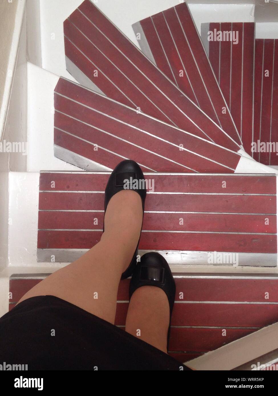 Walking down stairs low angle hi-res stock photography and images - Alamy