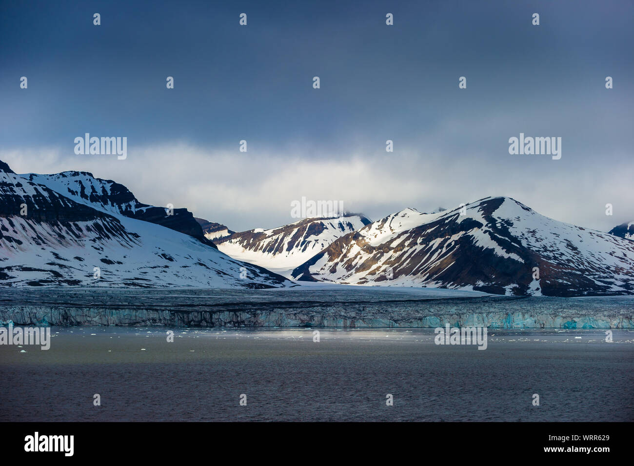 The end of a glacier in the Arctic Circle where it falls into the ...