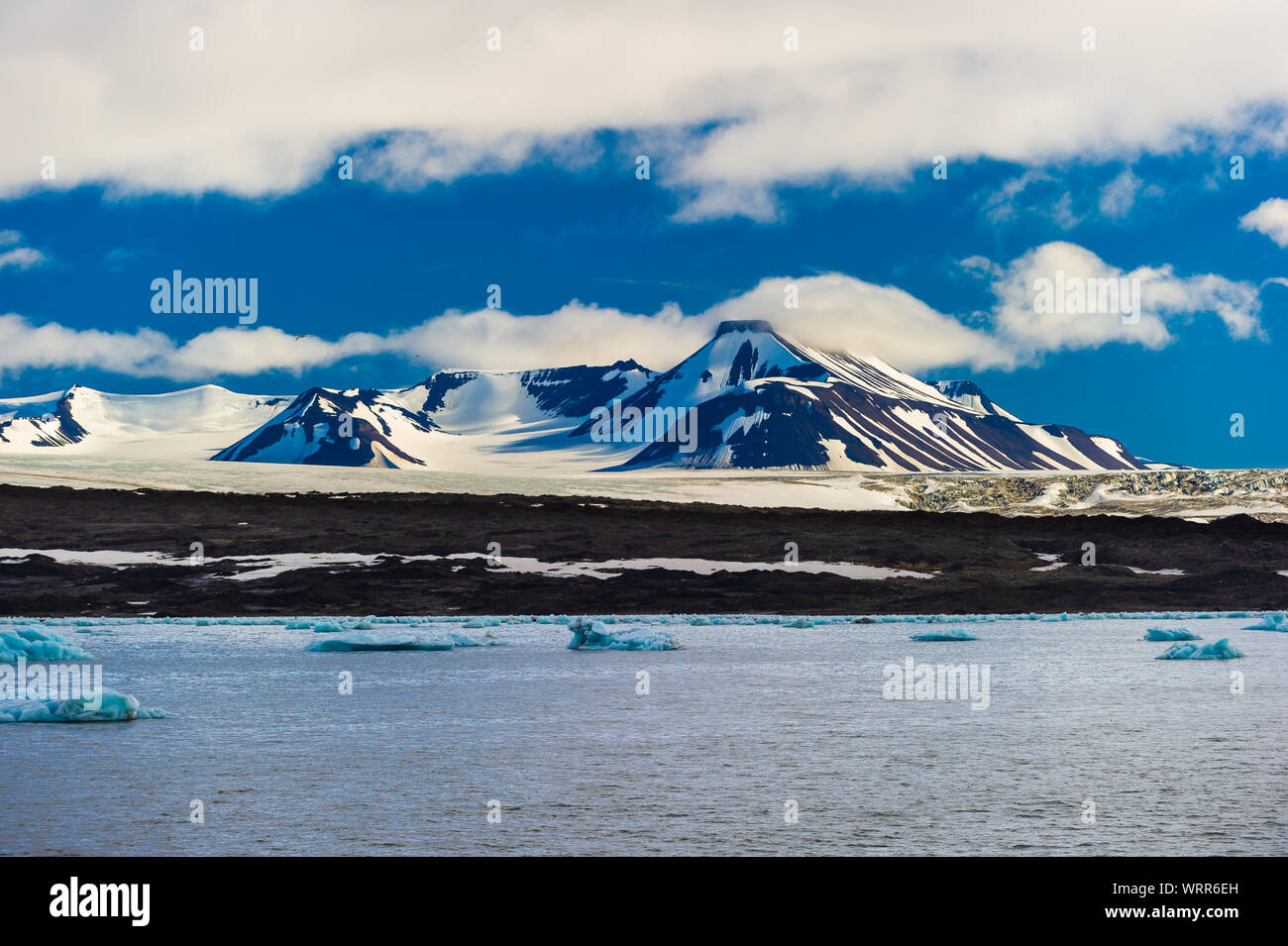 The end of a glacier in the Arctic Circle where it falls into the ...