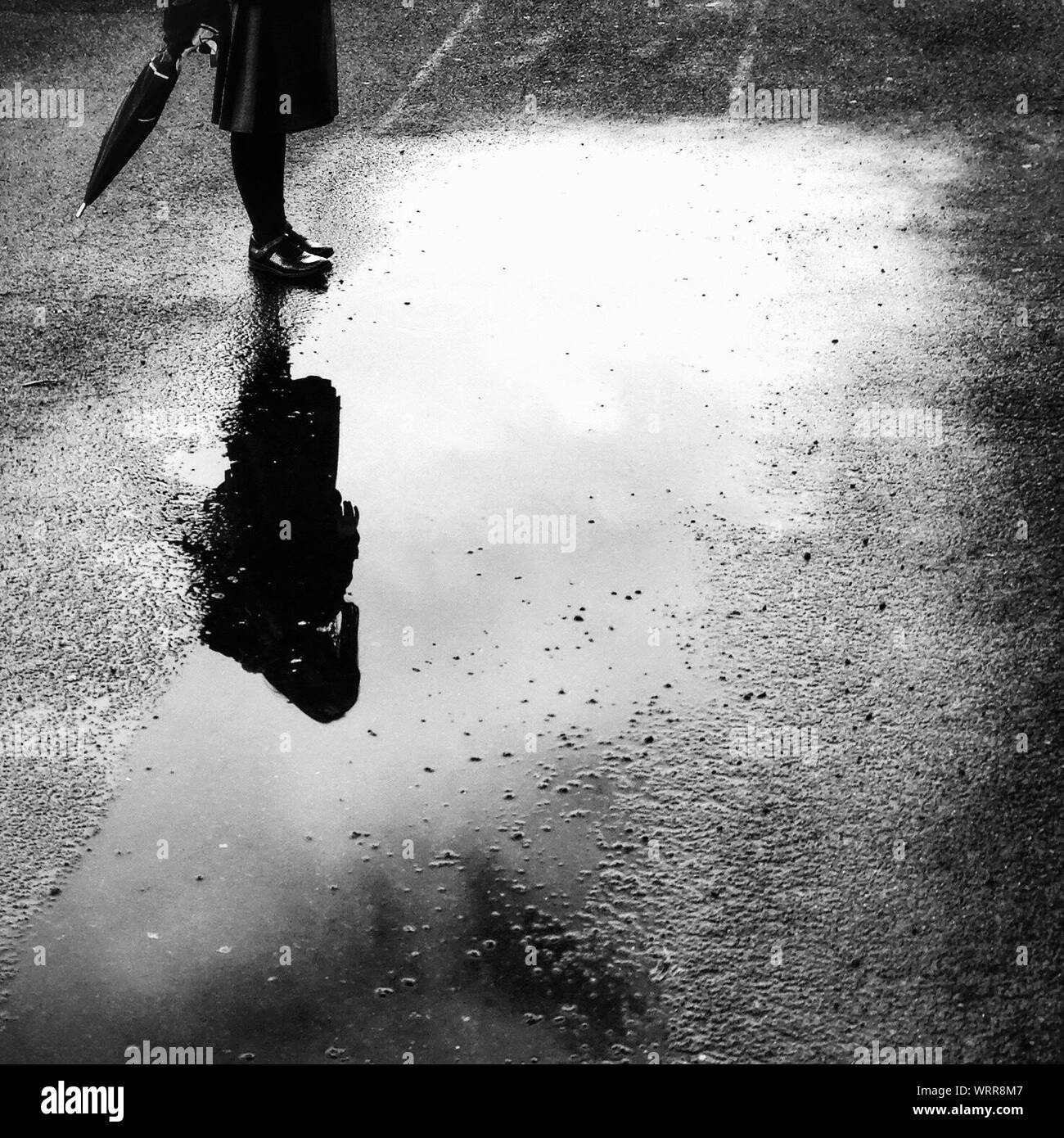 Puddle On Street High Resolution Stock Photography and Images - Alamy