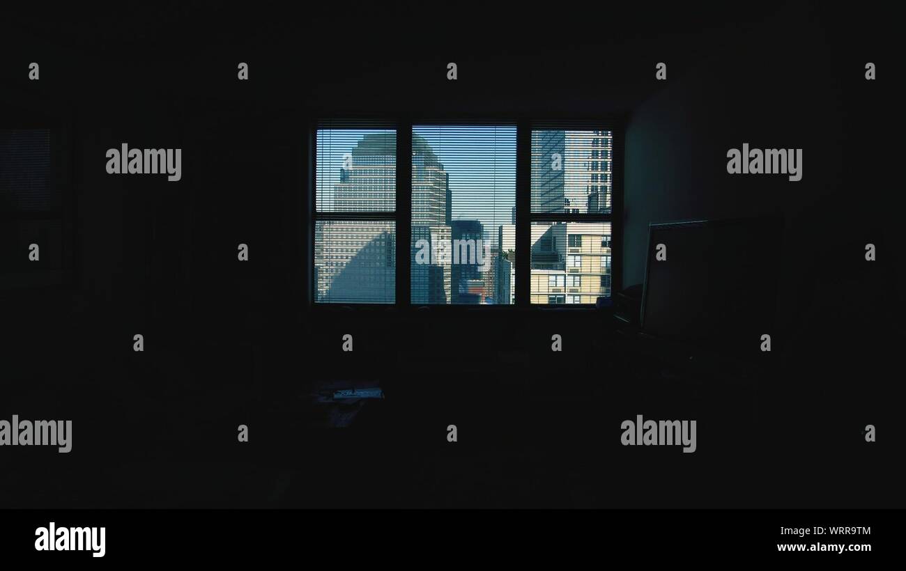 Buildings Seen Through Window Of Darkroom Stock Photo - Alamy