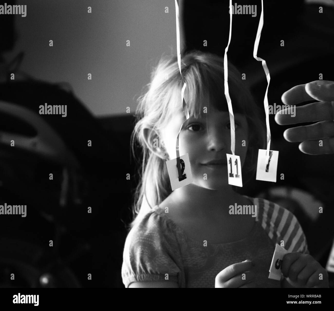 Person looking up at numbers Black and White Stock Photos & Images - Alamy