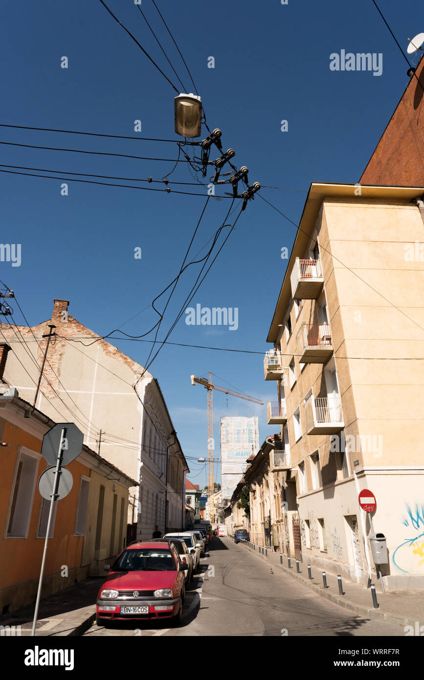 Electricity cables above a street Stock Photo - Alamy