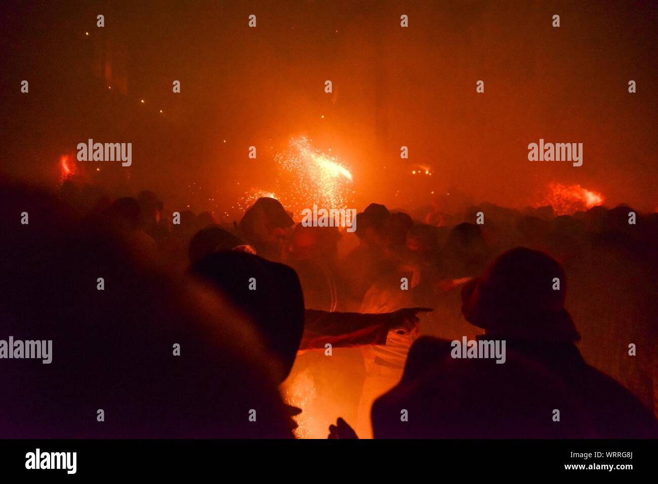 Group standing around hi-res stock photography and images - Alamy