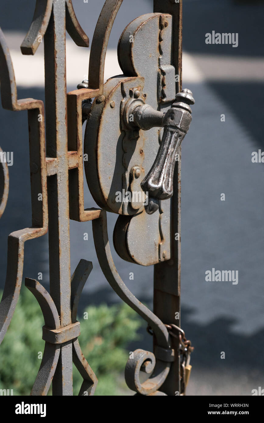 Iron gate door handle Stock Photo - Alamy