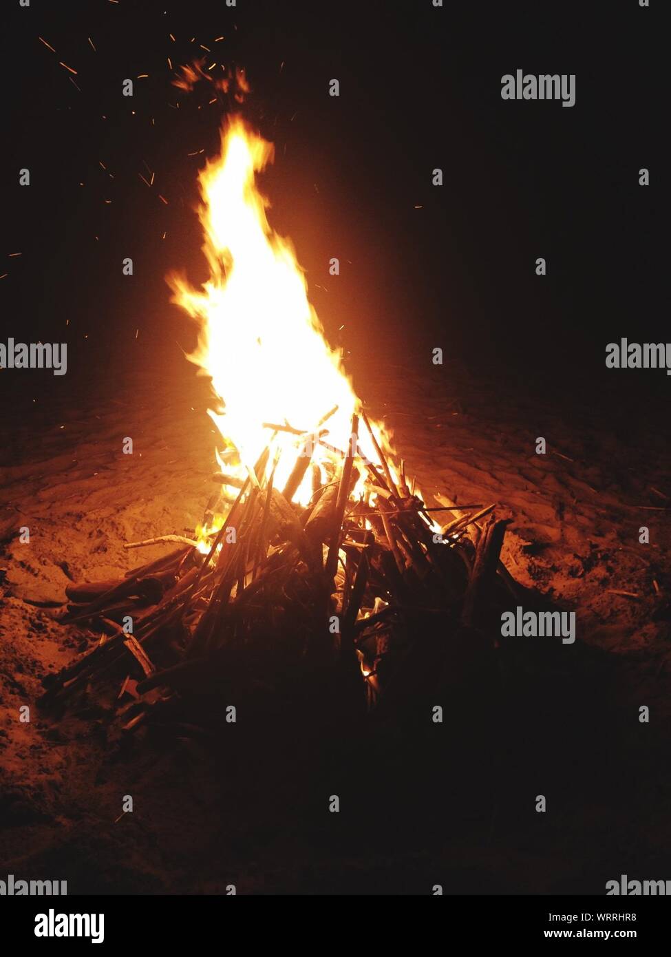 Bonfire burning on beach hi-res stock photography and images - Alamy