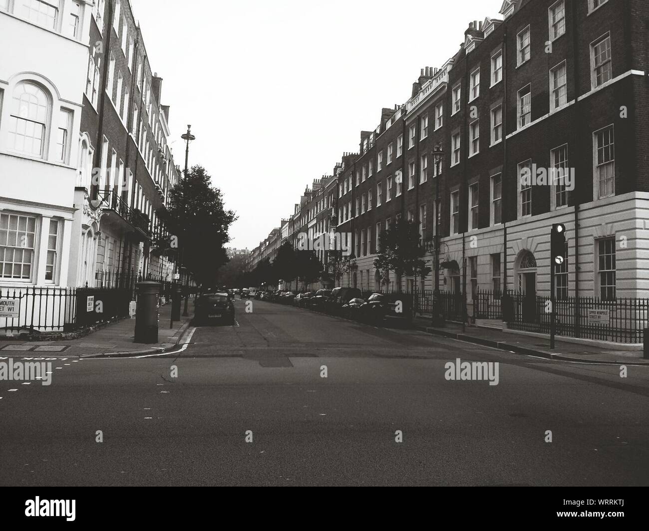 Empty residential street hi-res stock photography and images - Alamy
