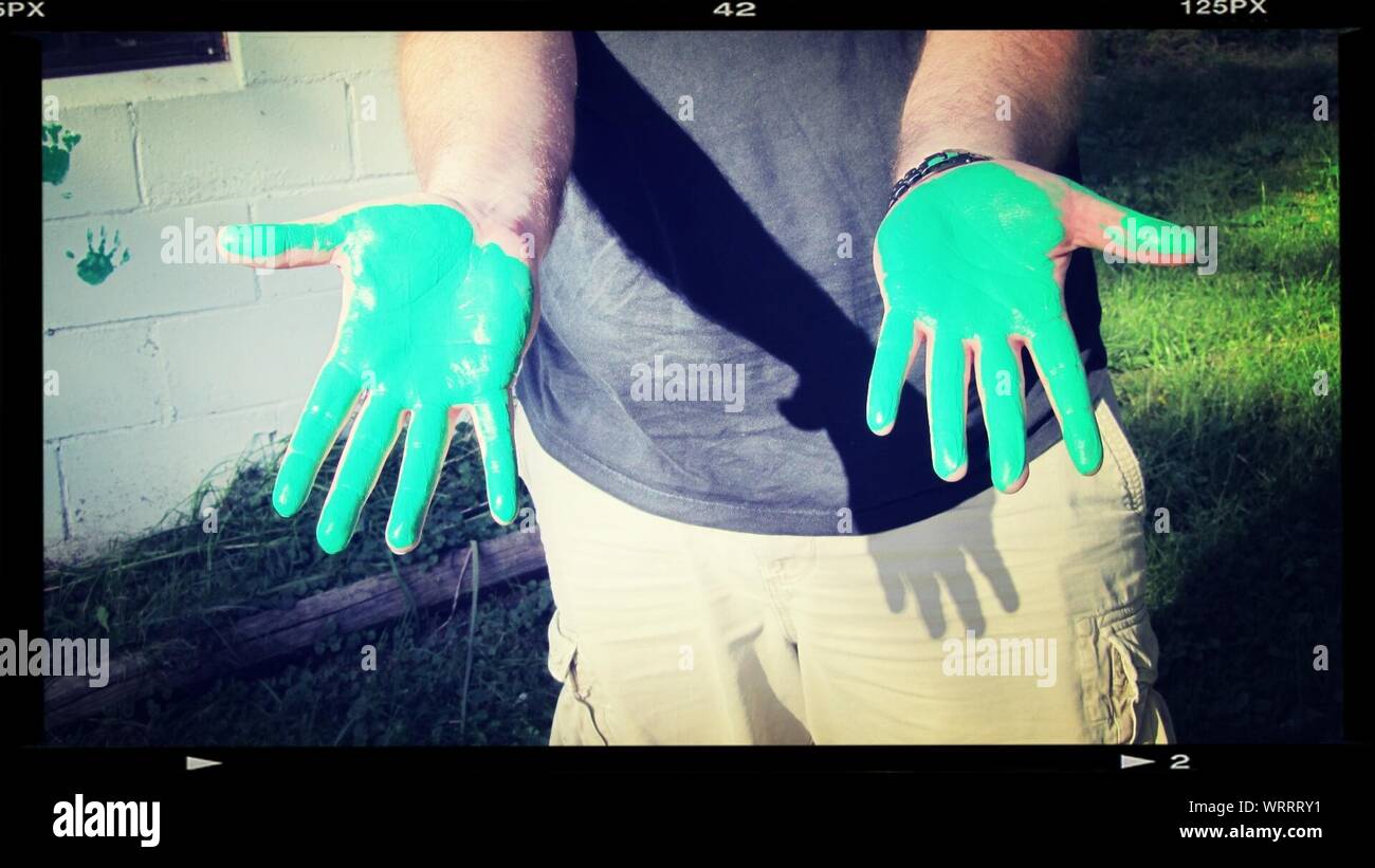 Man paint green hi-res stock photography and images - Alamy