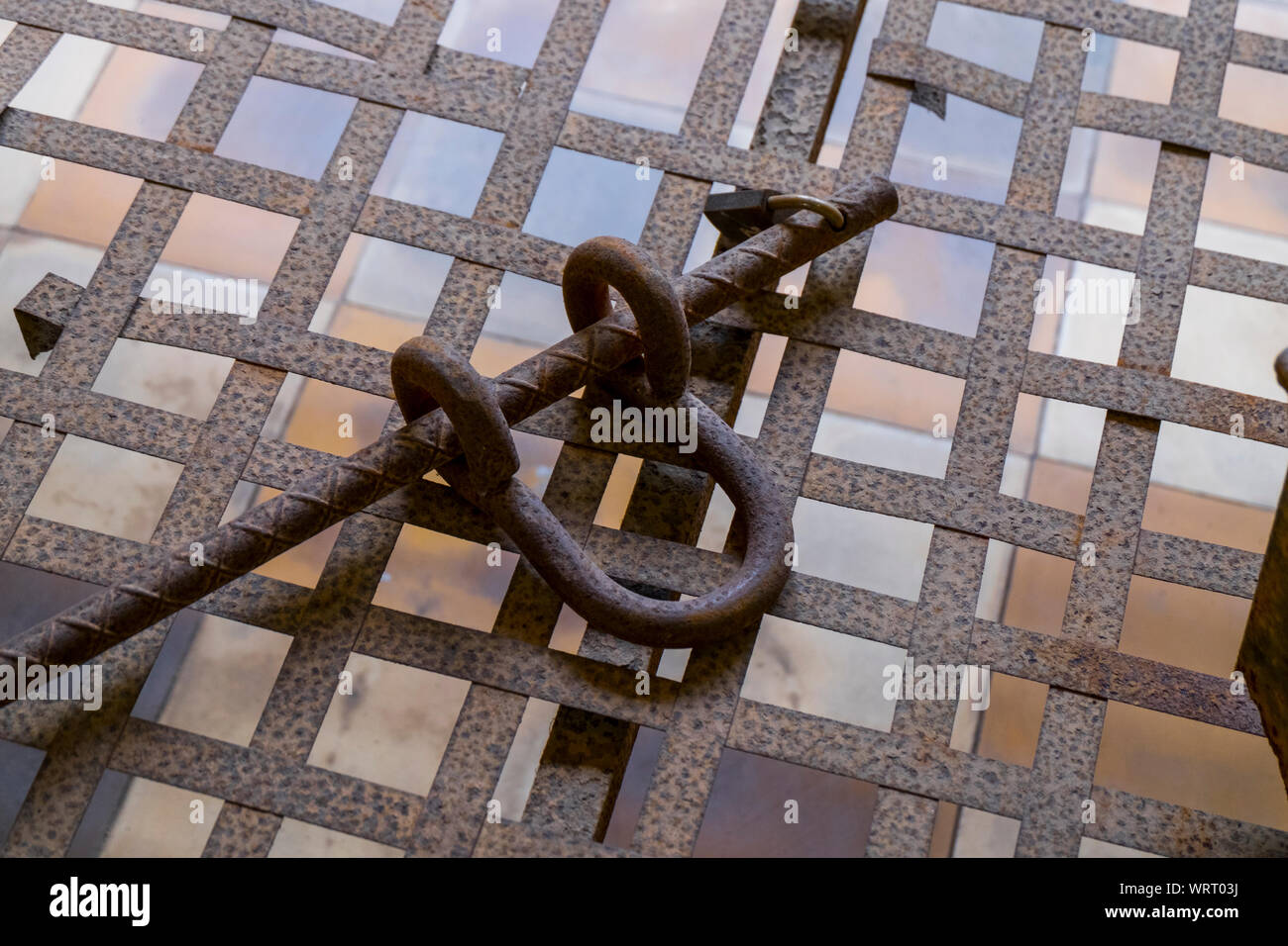 A closeup of a shackle device on a bed at Security Prison 21, SC-21 ...