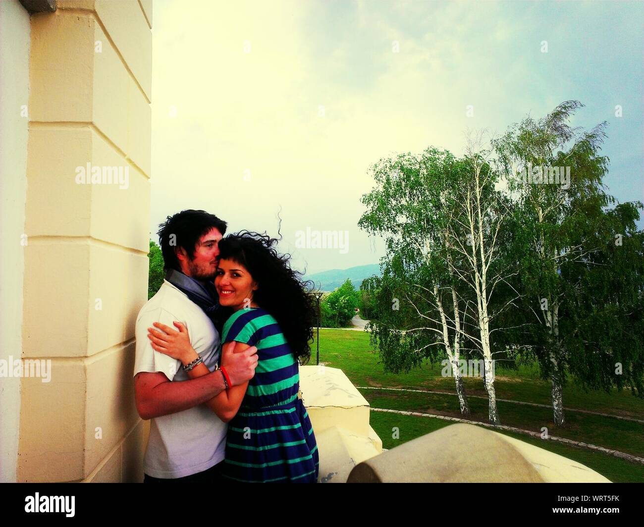 People looking over balcony hi-res stock photography and images - Alamy