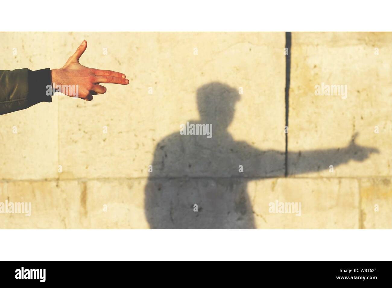 Gun Hand Shadow High Resolution Stock Photography and Images - Alamy