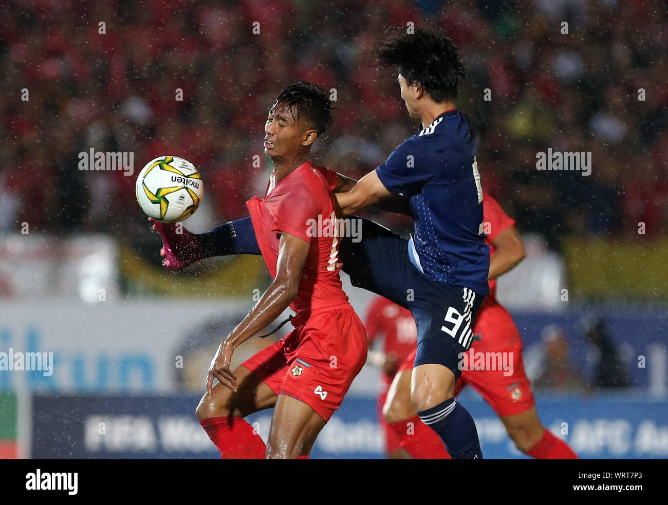 Yangon, Myanmar. 10th Sep, 2019. Soe Moe Kyaw (L) of Myanmar vies with ...