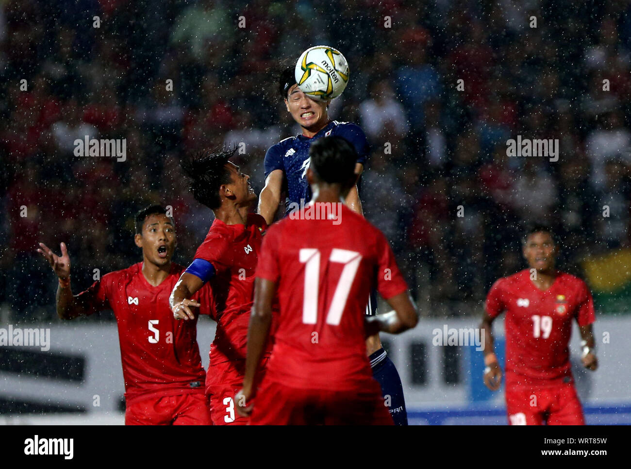 Yangon, Myanmar. 10th Sep, 2019. Takumi Minamino (Top) of Japan ...