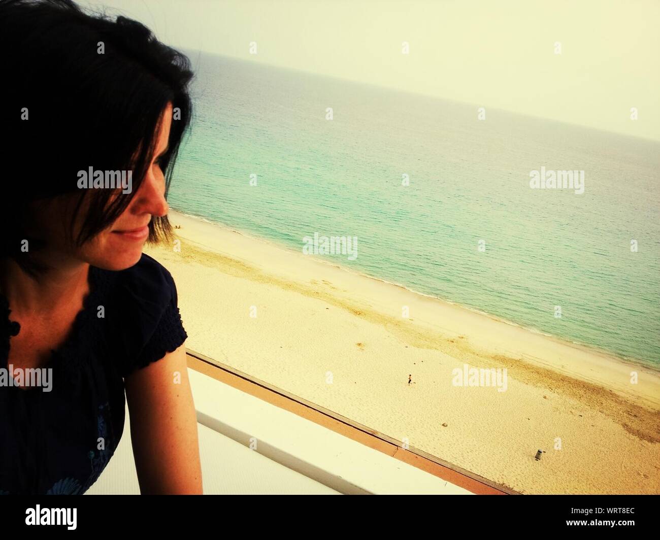 People Looking Over Balcony High Resolution Stock Photography and ...