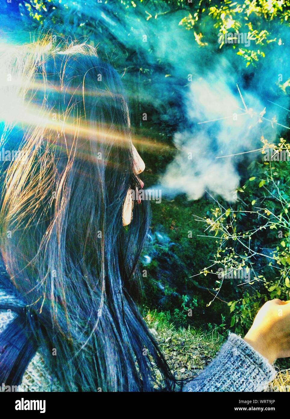 Woman smoking in tree hi-res stock photography and images - Alamy