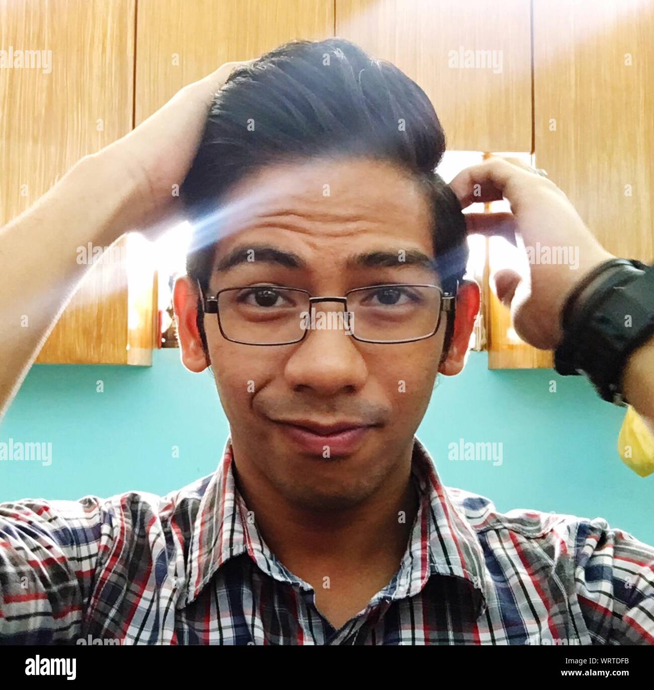 Man looking confused at home hi-res stock photography and images - Alamy