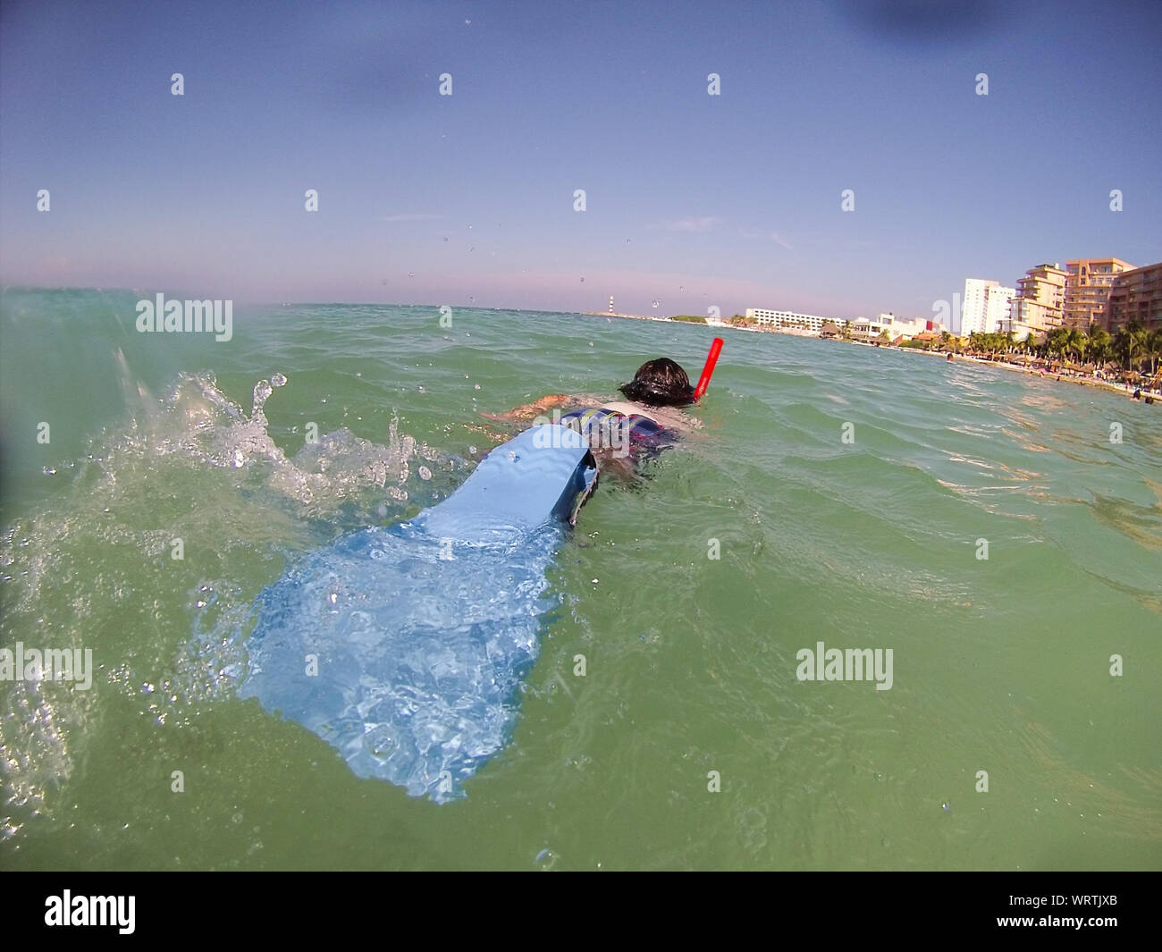 Boy diving into sea hi-res stock photography and images - Alamy