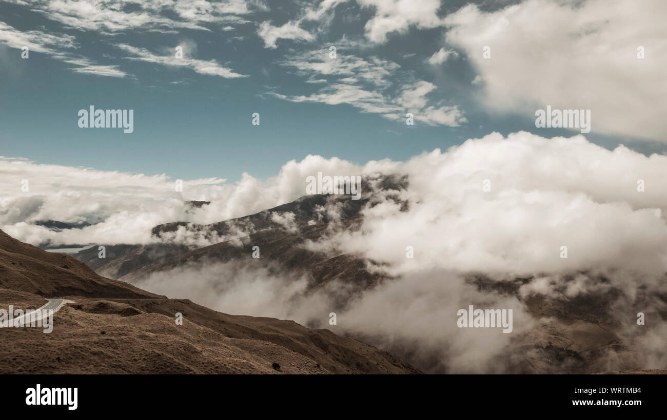 Cloud over mountains hi-res stock photography and images - Alamy