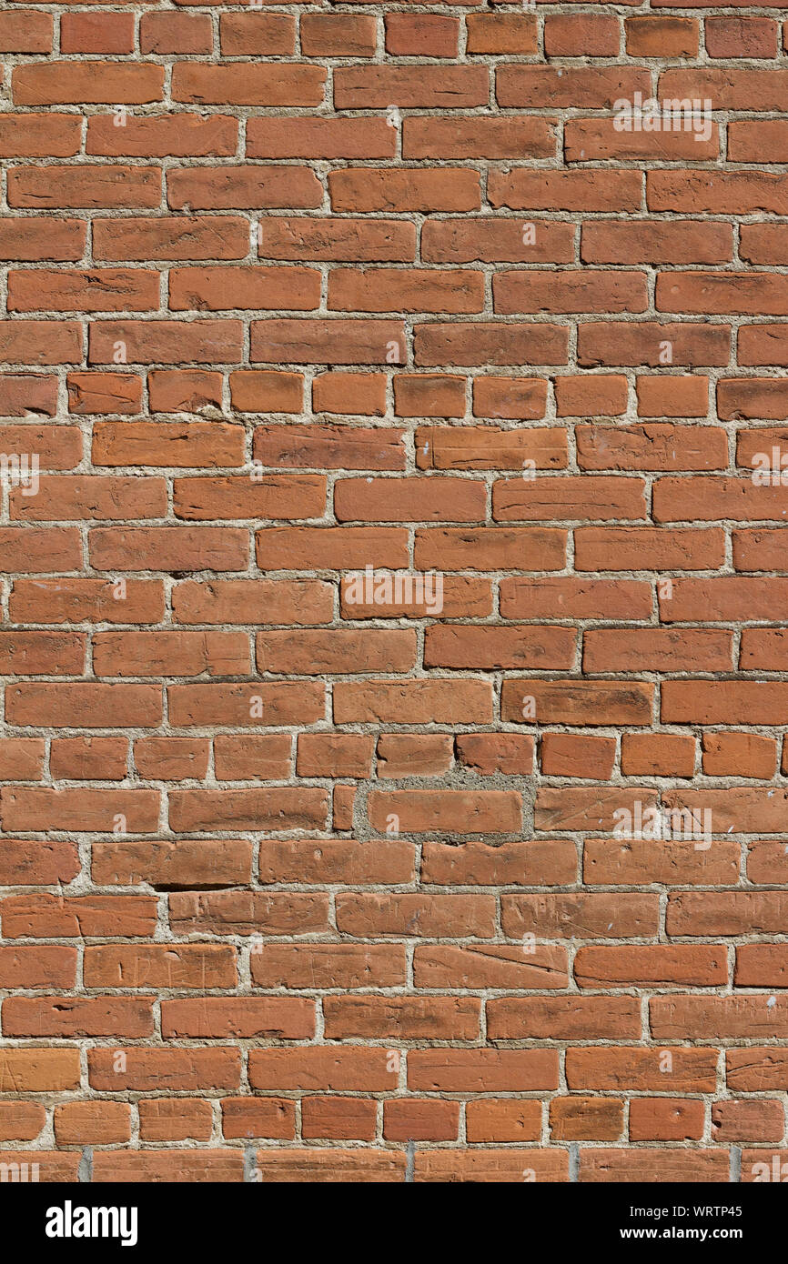 Shabby old red clay brick wall texture in common bond brickwork pattern ...