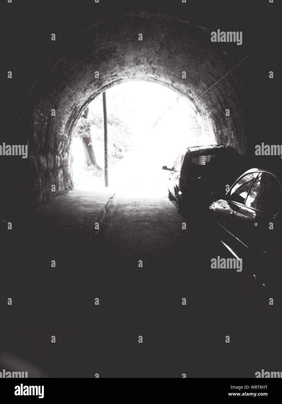 Car passing through tunnel hi-res stock photography and images - Alamy