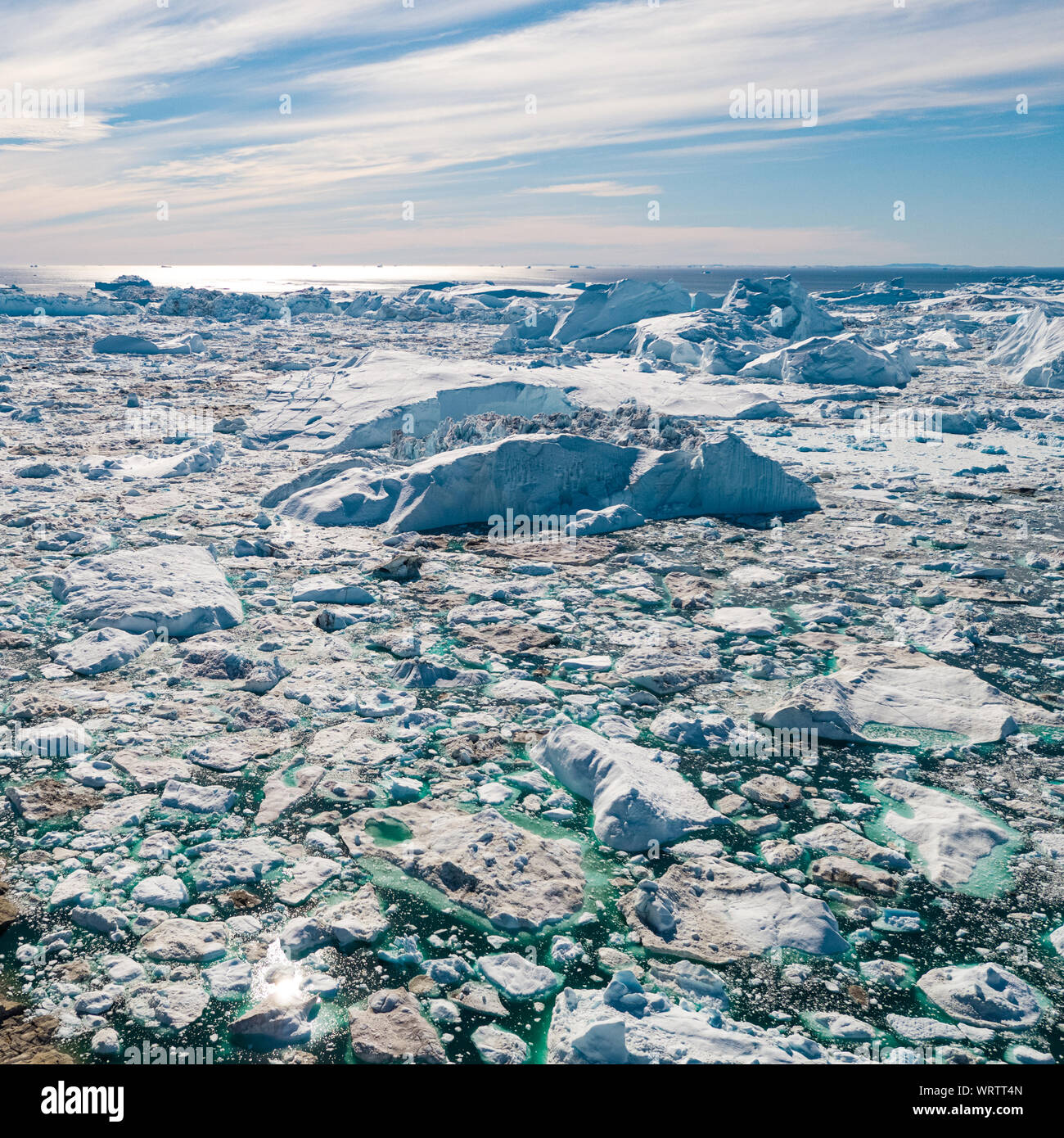 Iceberg and ice from glacier in arctic nature landscape on Greenland ...