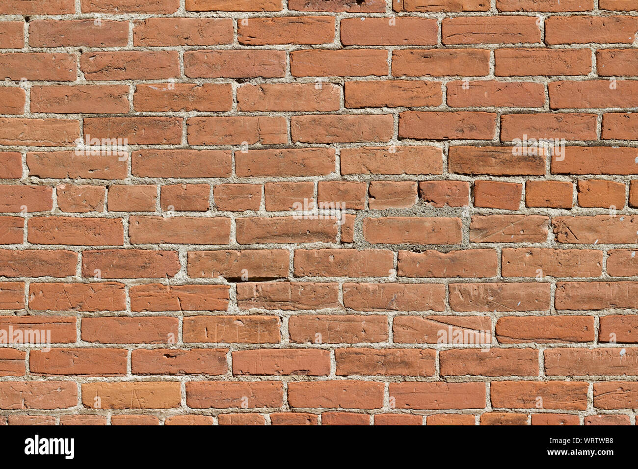 Shabby old red clay brick wall texture in common bond brickwork pattern ...