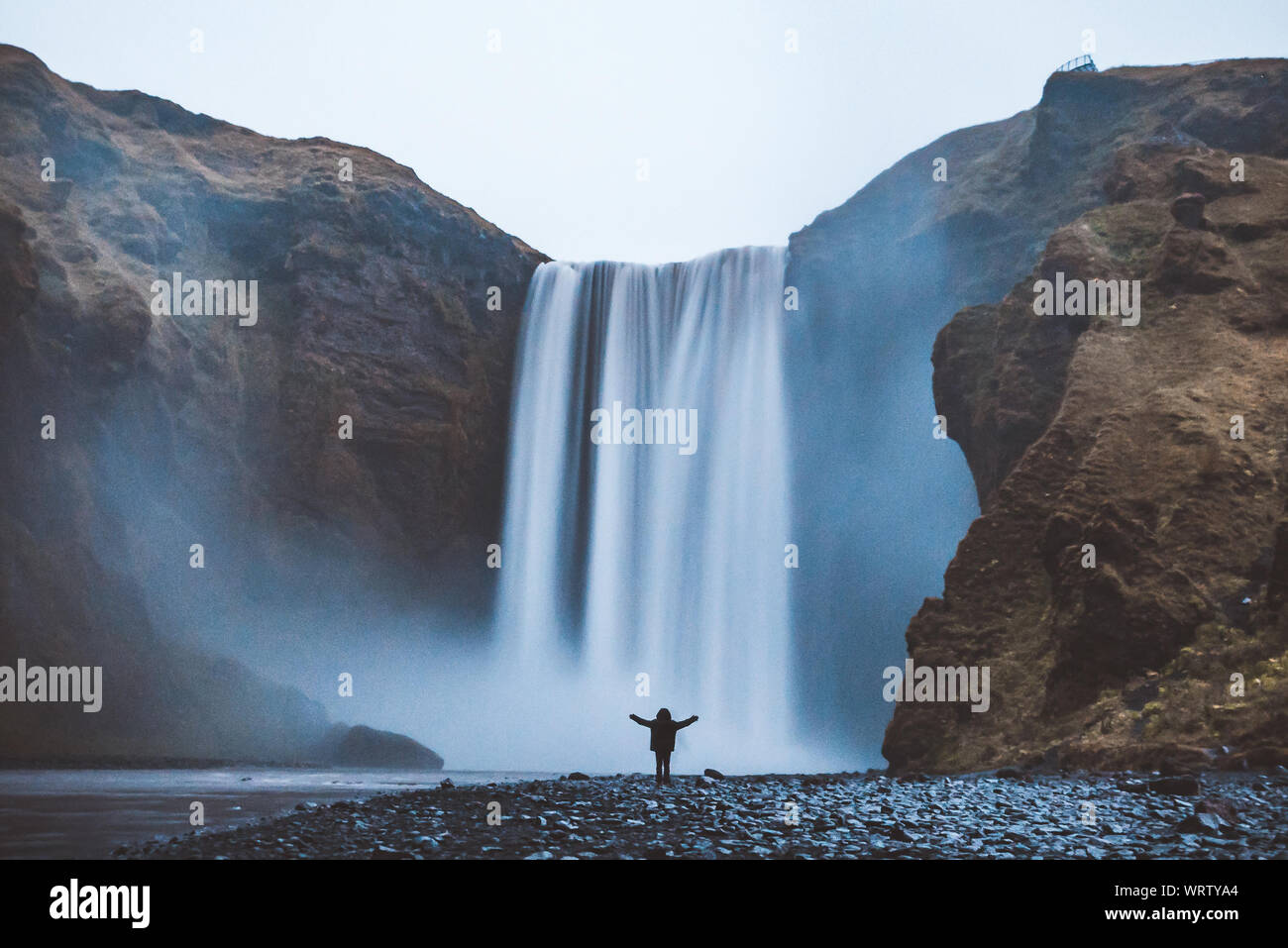 Waterfall woman arms High Resolution Stock Photography and Images - Alamy