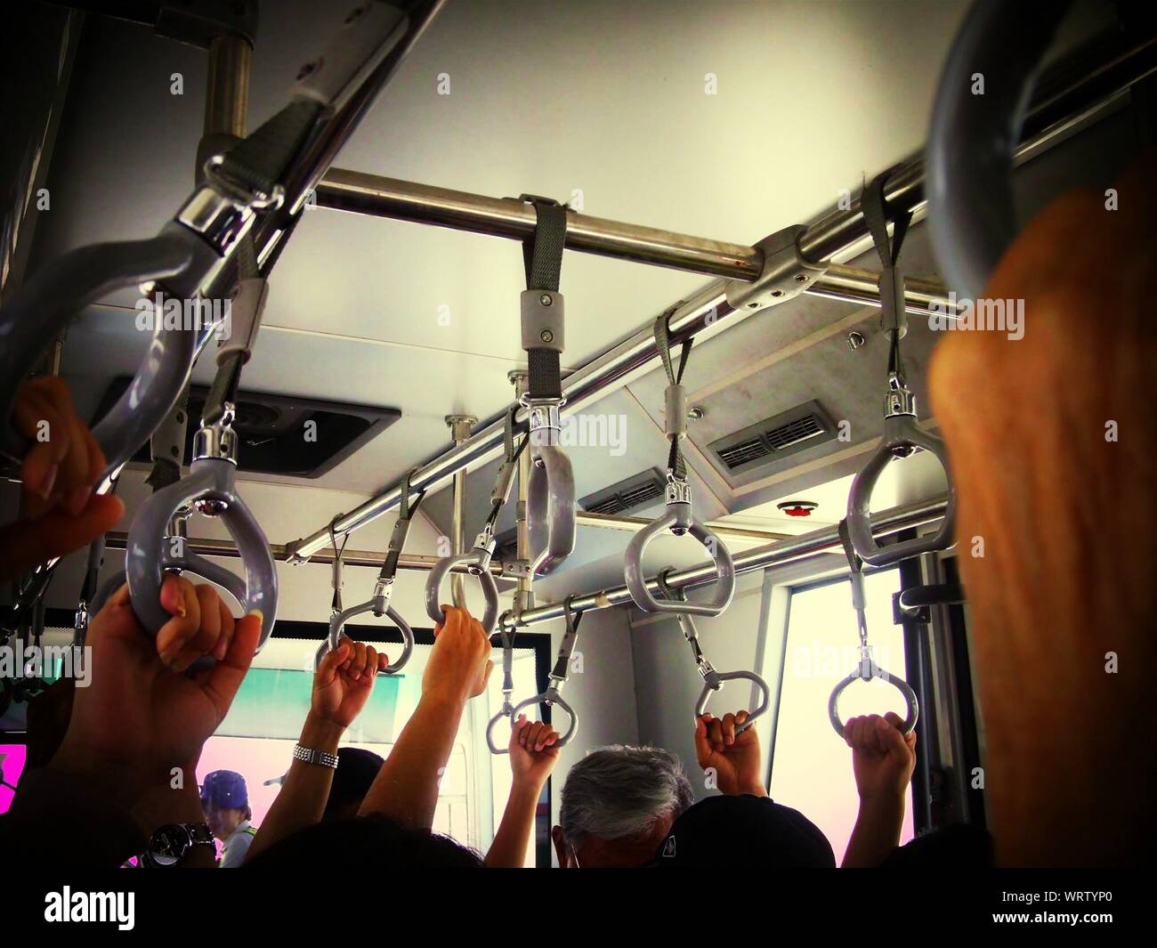 Holding train handle hi-res stock photography and images - Alamy