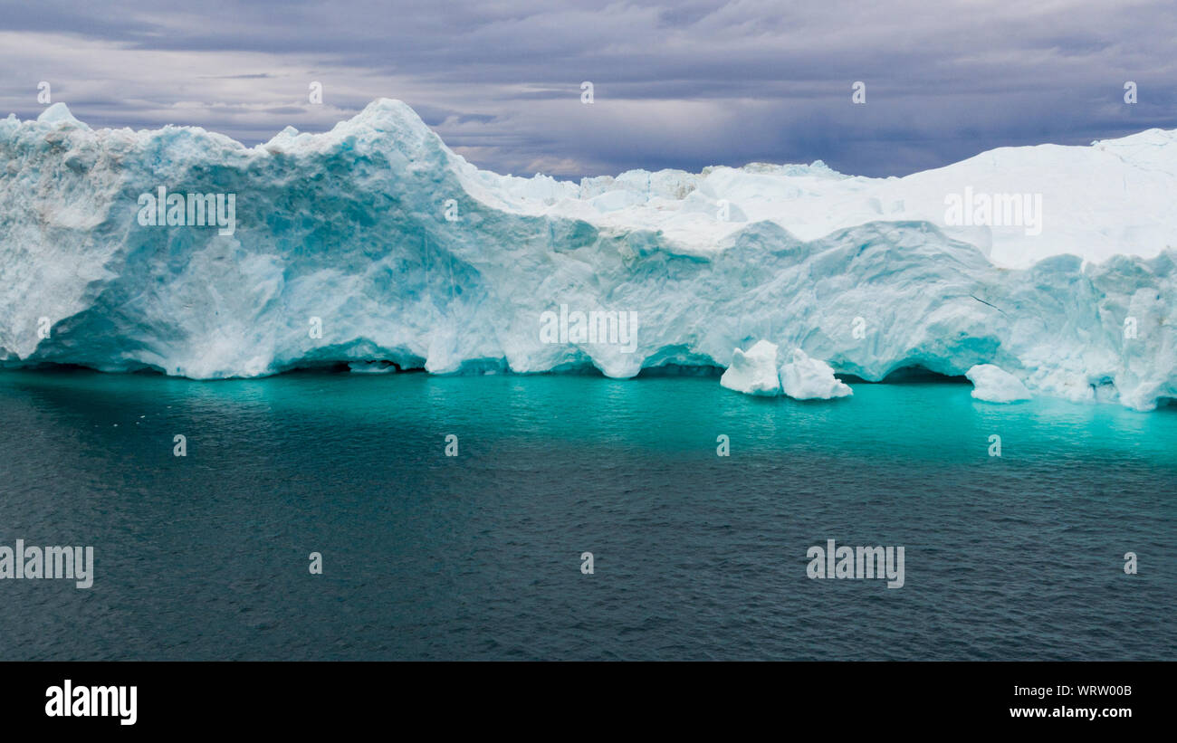 Iceberg from glacier in arctic nature landscape on Greenland. Aerial ...