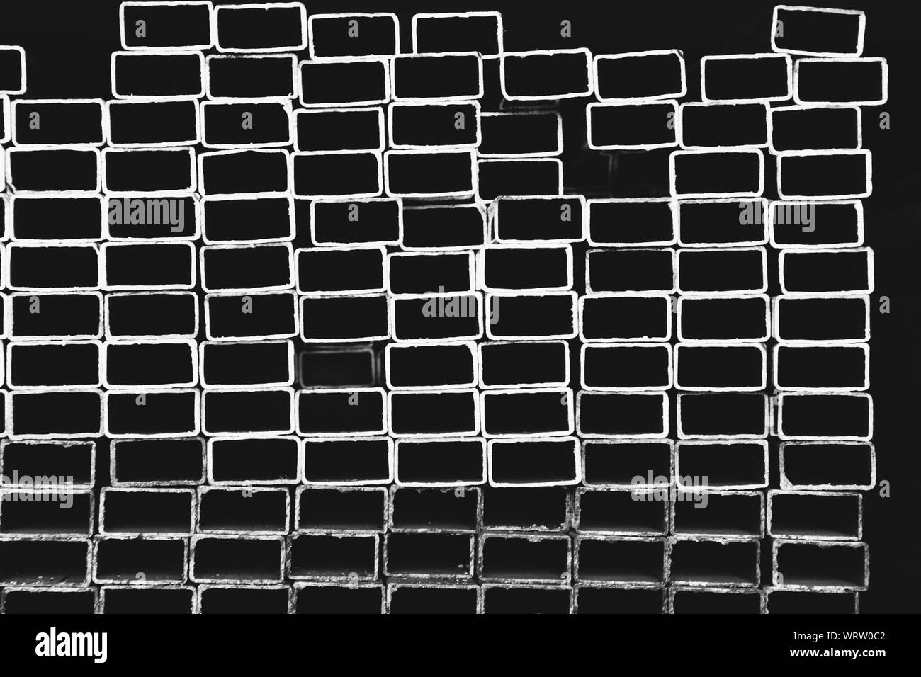 Stack Of Metallic Rectangles On Black Background Stock Photo - Alamy