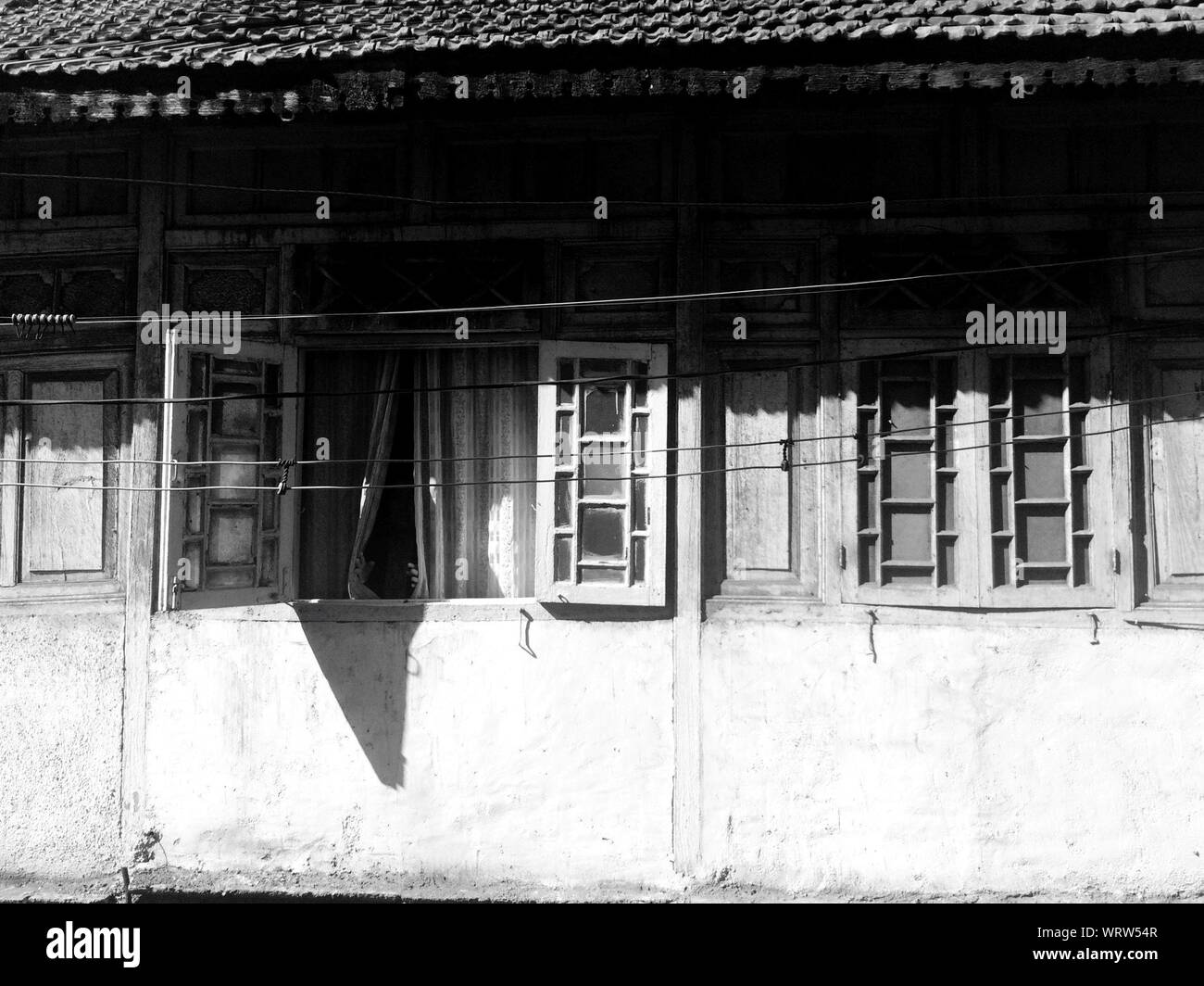 House with open windows hi-res stock photography and images - Alamy