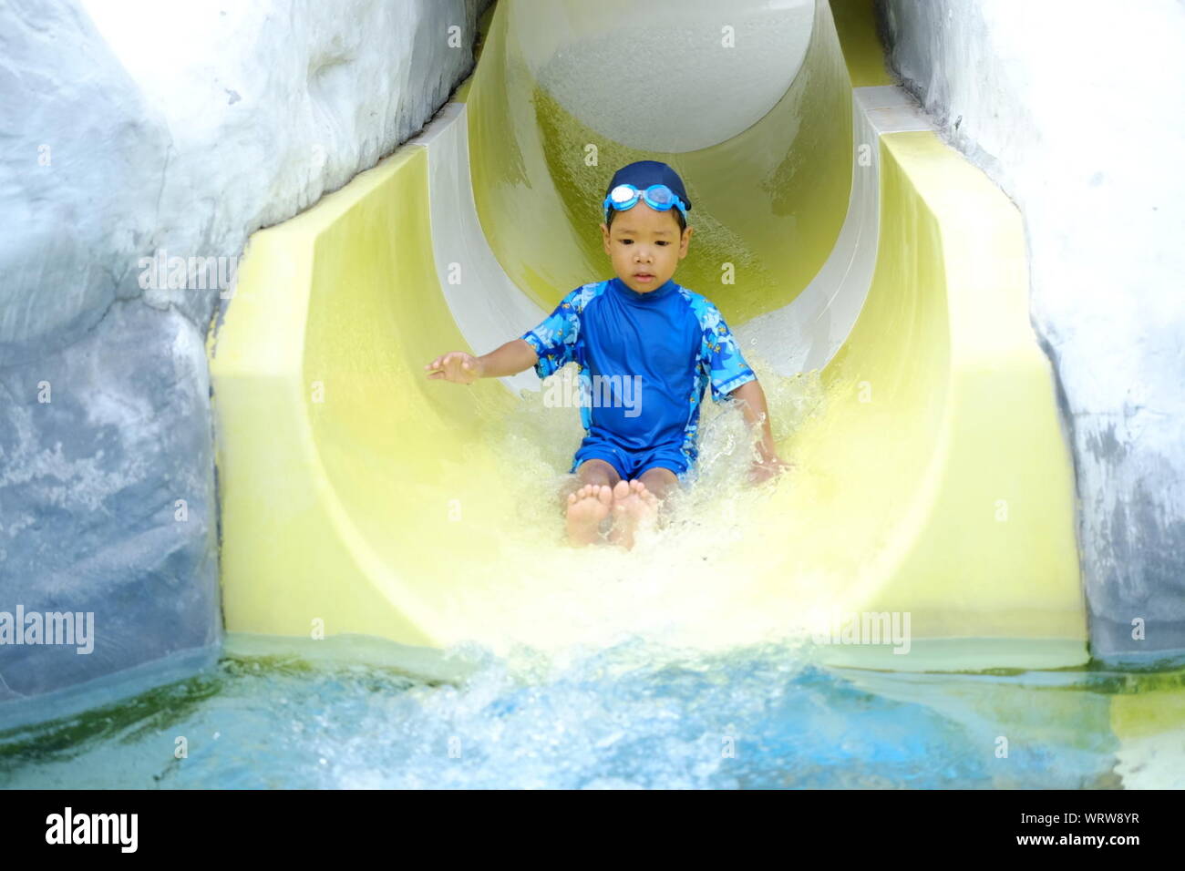 Water slide boy hi-res stock photography and images - Alamy