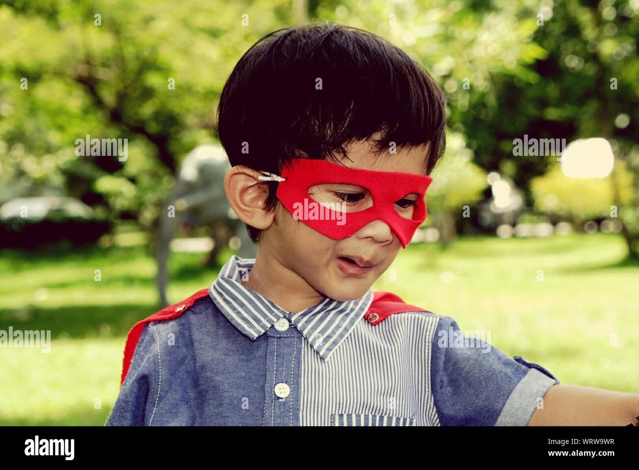 Wearing red cape hi-res stock photography and images - Alamy