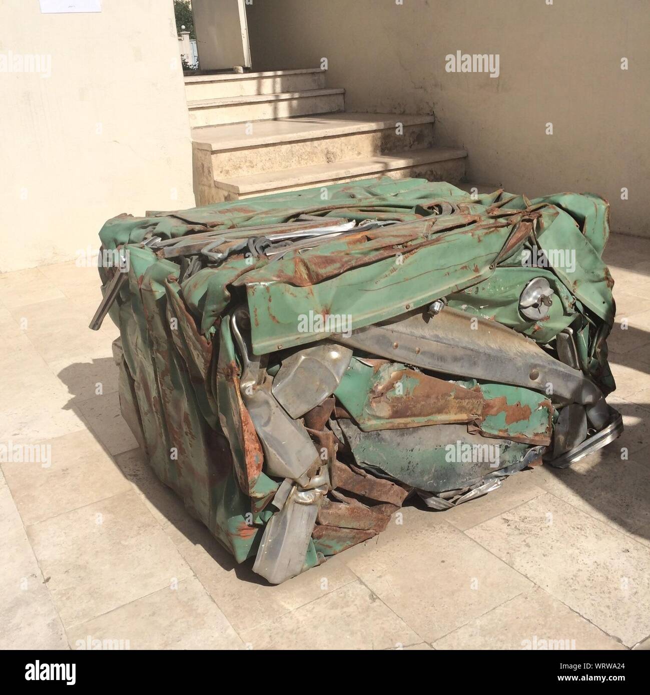 Damaged Metal Structure Outside Building Stock Photo - Alamy