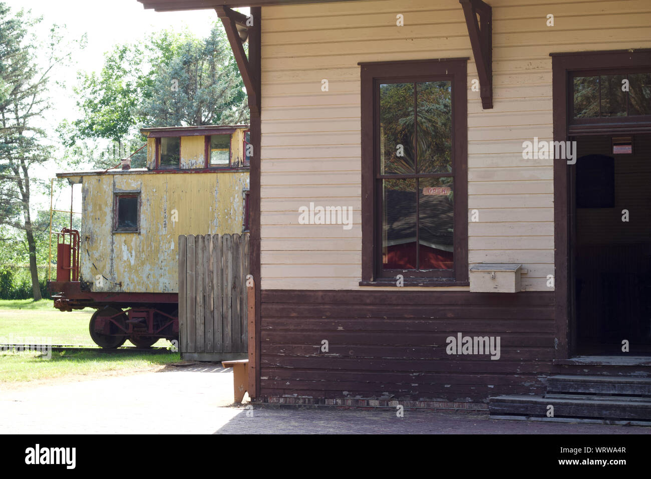 Old 19th Century rural American train station with caboose in ...