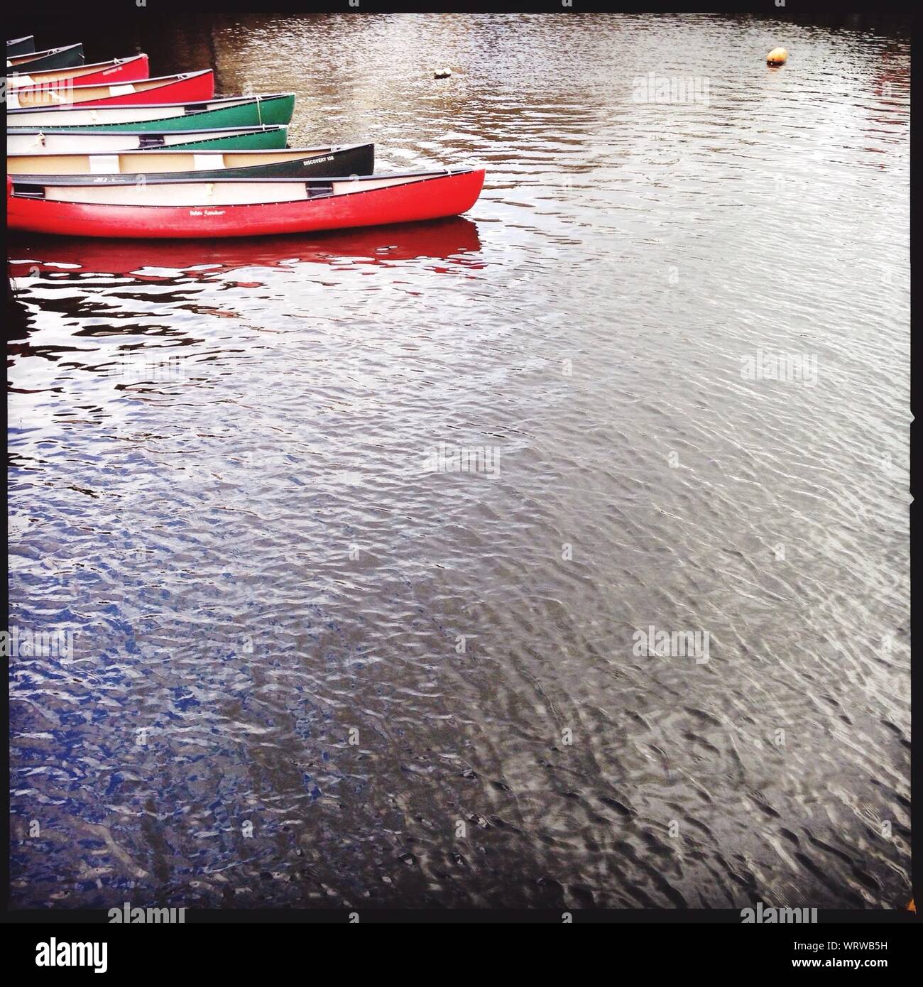 Canoes In Sea Stock Photo - Alamy