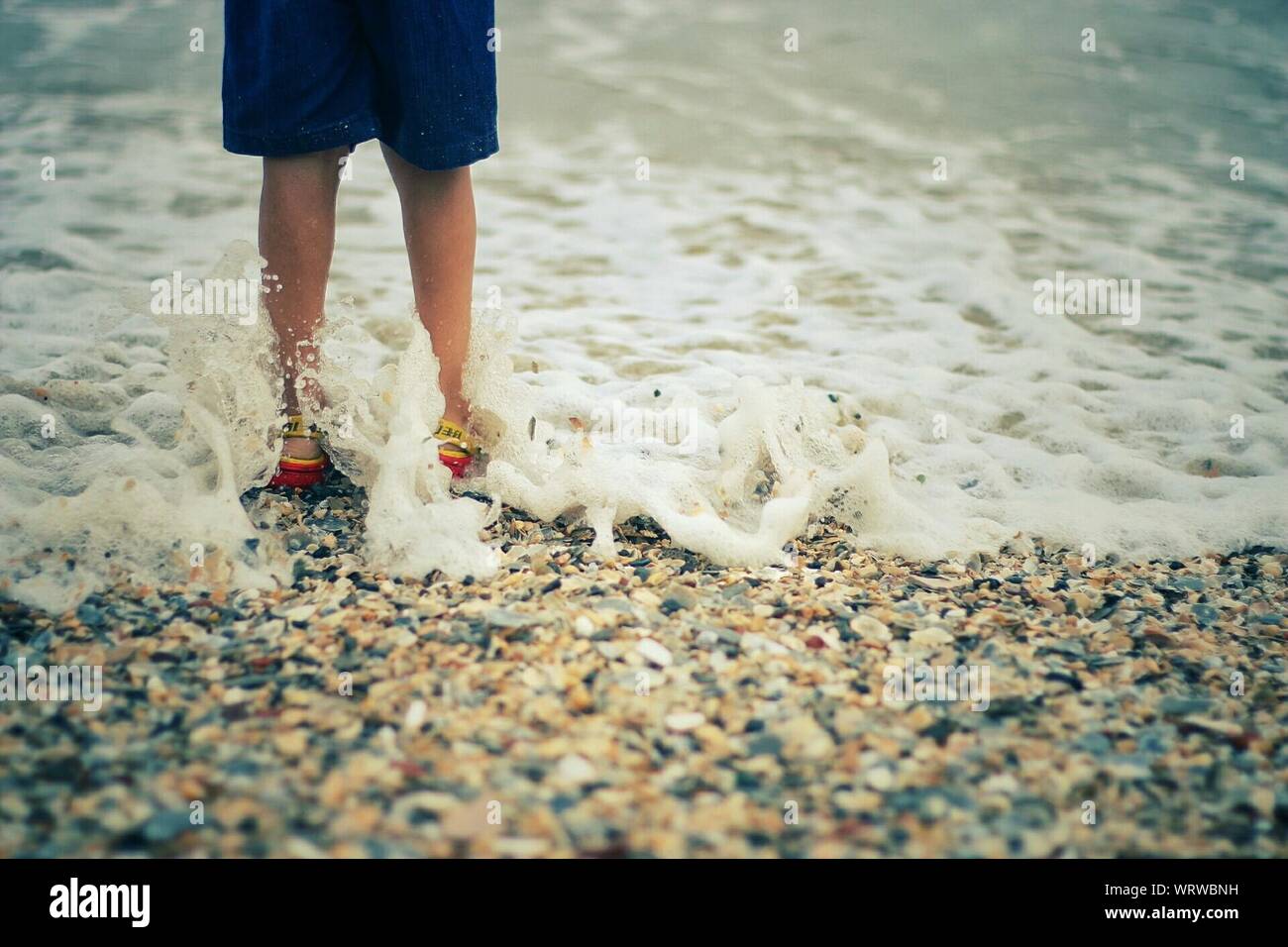 Boy waters hi-res stock photography and images - Alamy