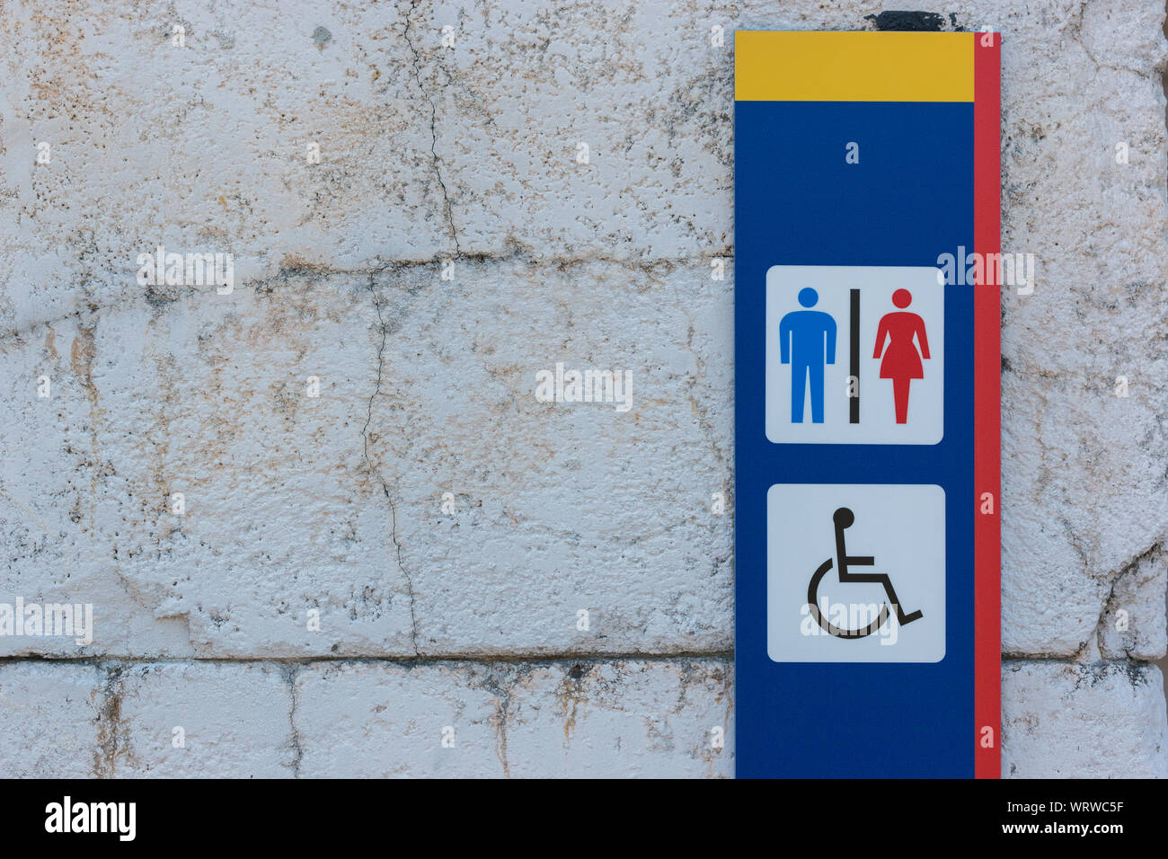 Toilet sign for men women and cripple on the wall Stock Photo - Alamy