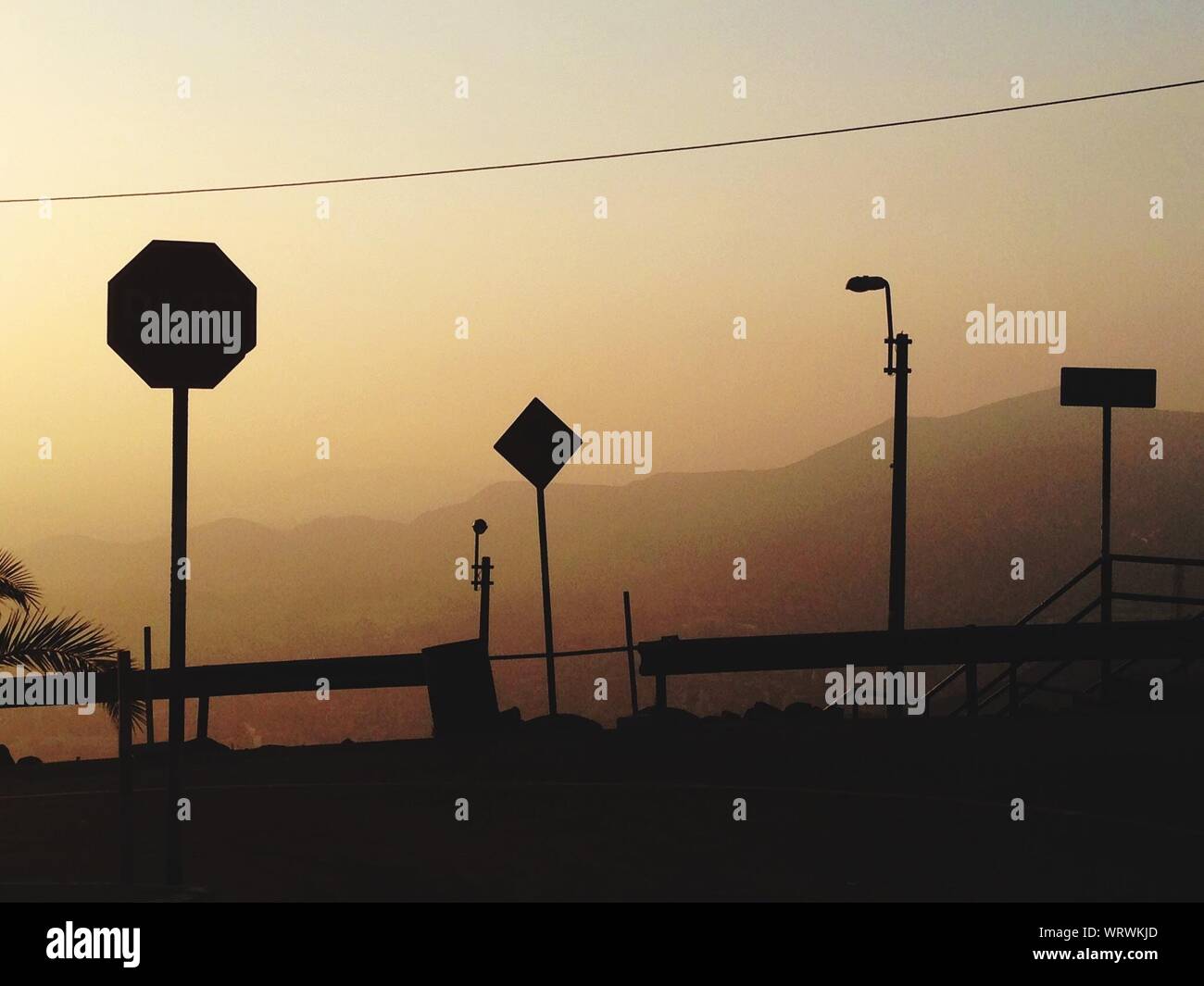 Signs sunset hi-res stock photography and images - Alamy
