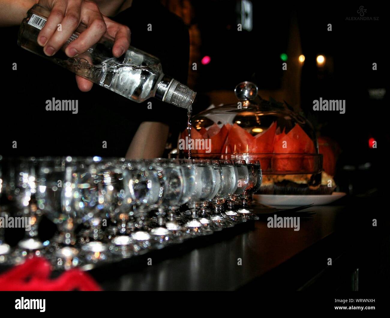 Man pouring alcohol hi-res stock photography and images - Alamy