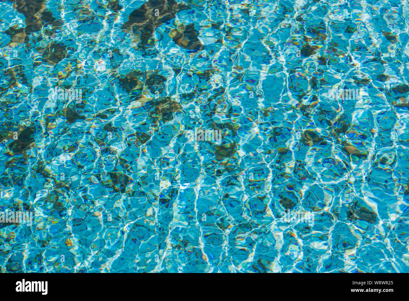 Blue swimming pool water surface texture background Stock Photo - Alamy