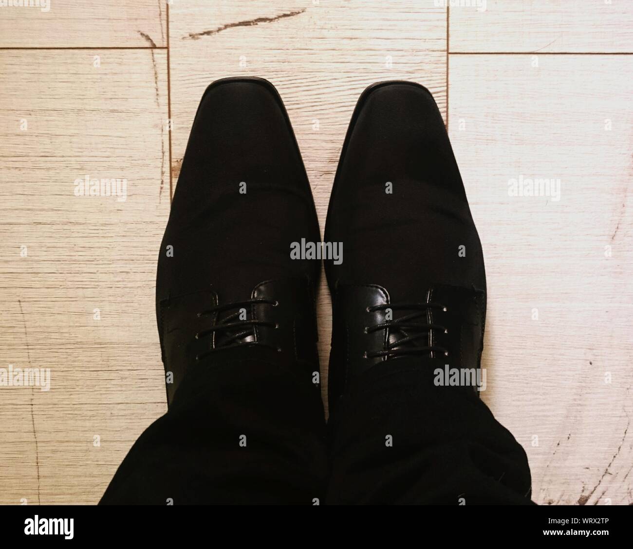 Man wearing black shoes hi-res stock photography and images - Alamy