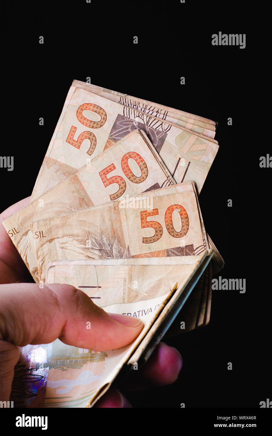 Brazilian currency. photograph of several fifty reais notes Stock Photo ...