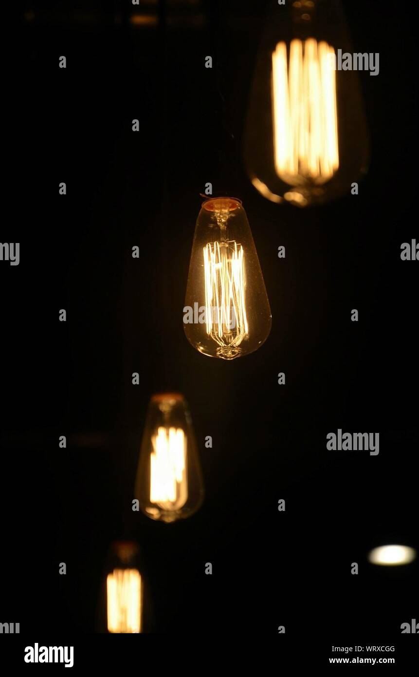 Light bulb filament close up lit up hi-res stock photography and images ...