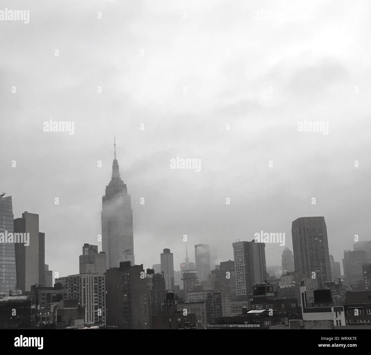 Empire state building weather hi-res stock photography and images - Alamy