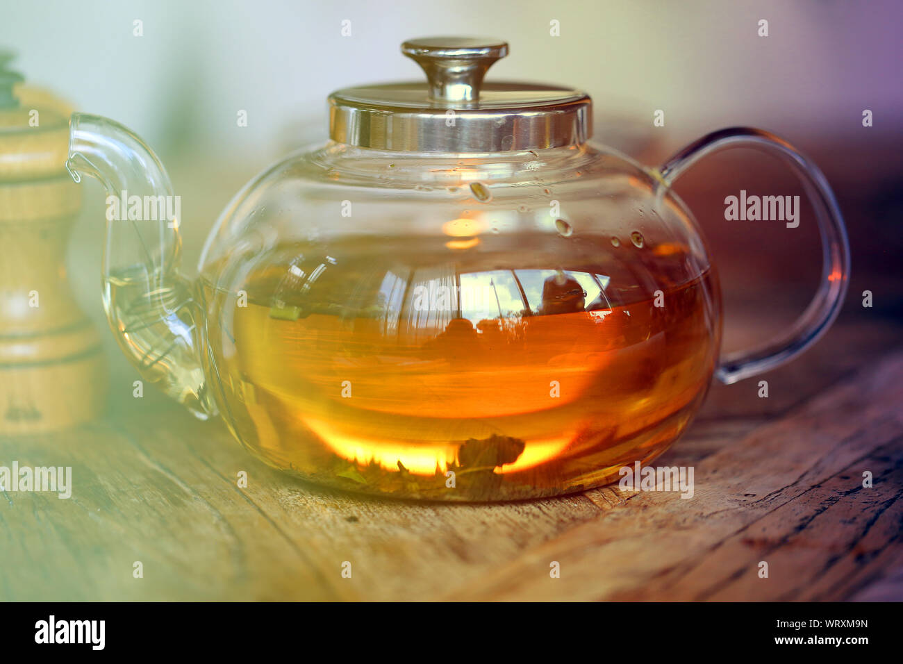 Tasty bright herbal tea close-up in a restaurant in a transparent bowl ...