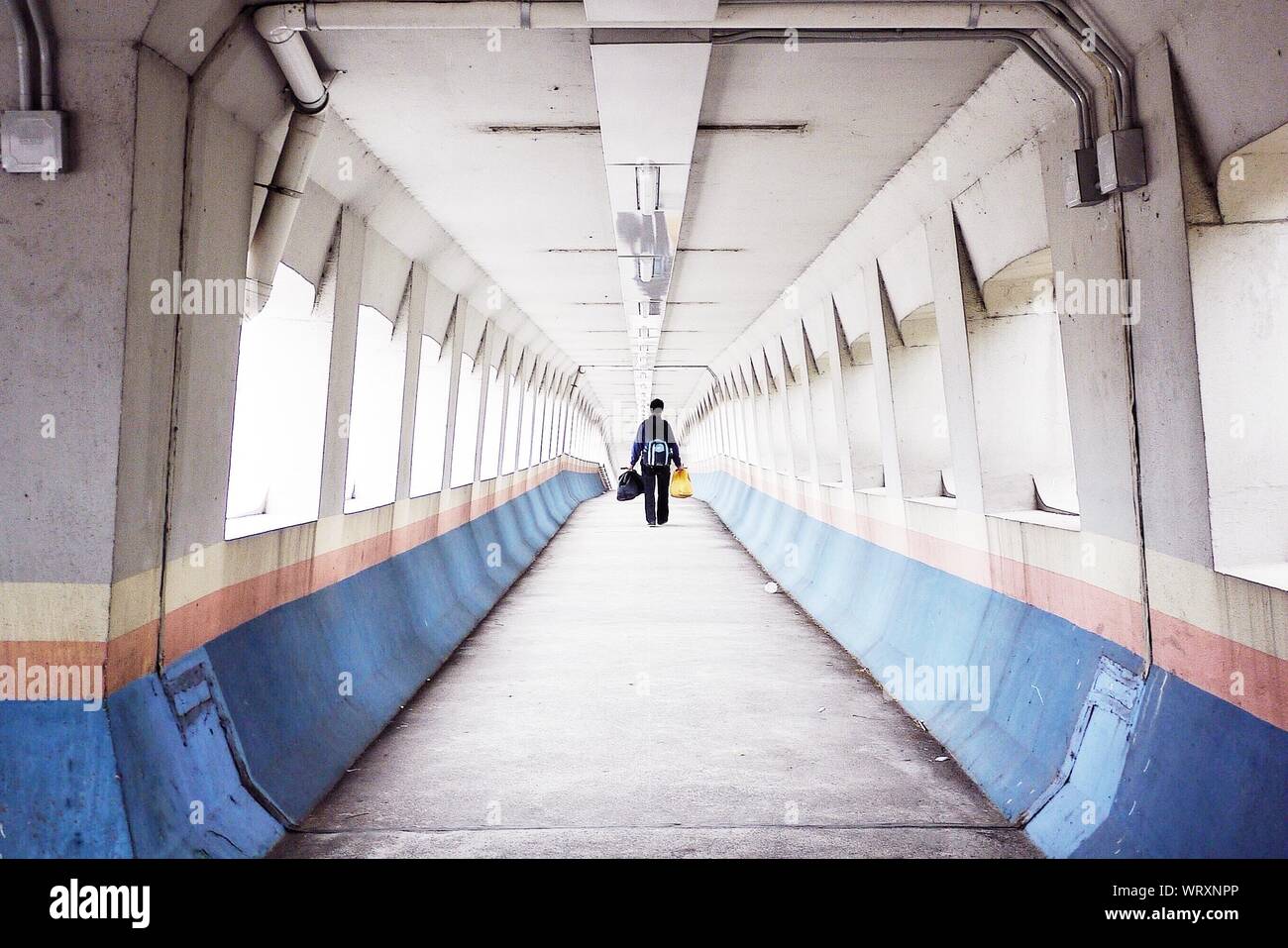 Walking through corridor hi-res stock photography and images - Alamy