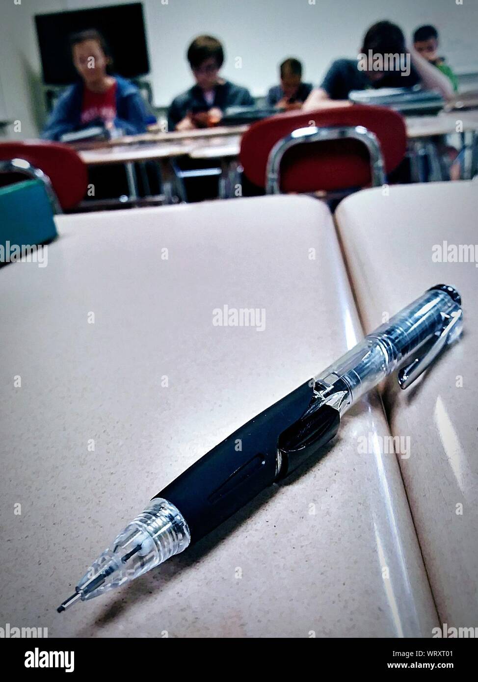 Teenager boys in classroom hi-res stock photography and images - Alamy
