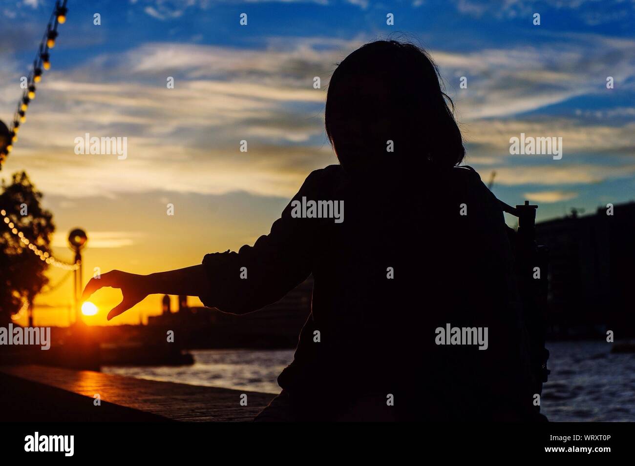 Woman Catching The Sun High Resolution Stock Photography and Images - Alamy